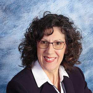 Amy Irvine, CFP®, EA, MPAS®, CCFC, CDFA®, CFT-I™ - Rooted Planning Group